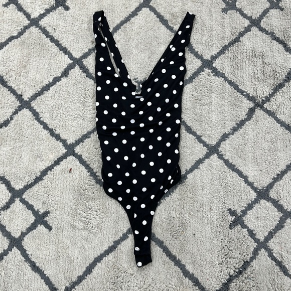 Lulus | Tops | Lulus Black White Polka Dot Cross Back Bodysuit Great ...